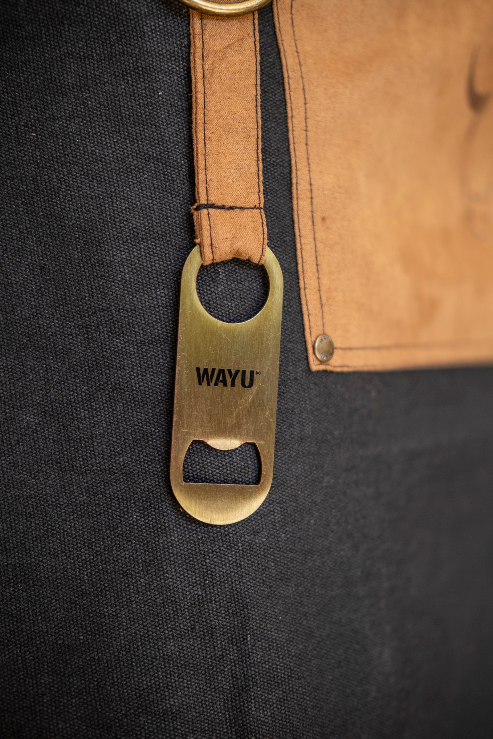 Mandil con destapador Wayu – Wayu cl